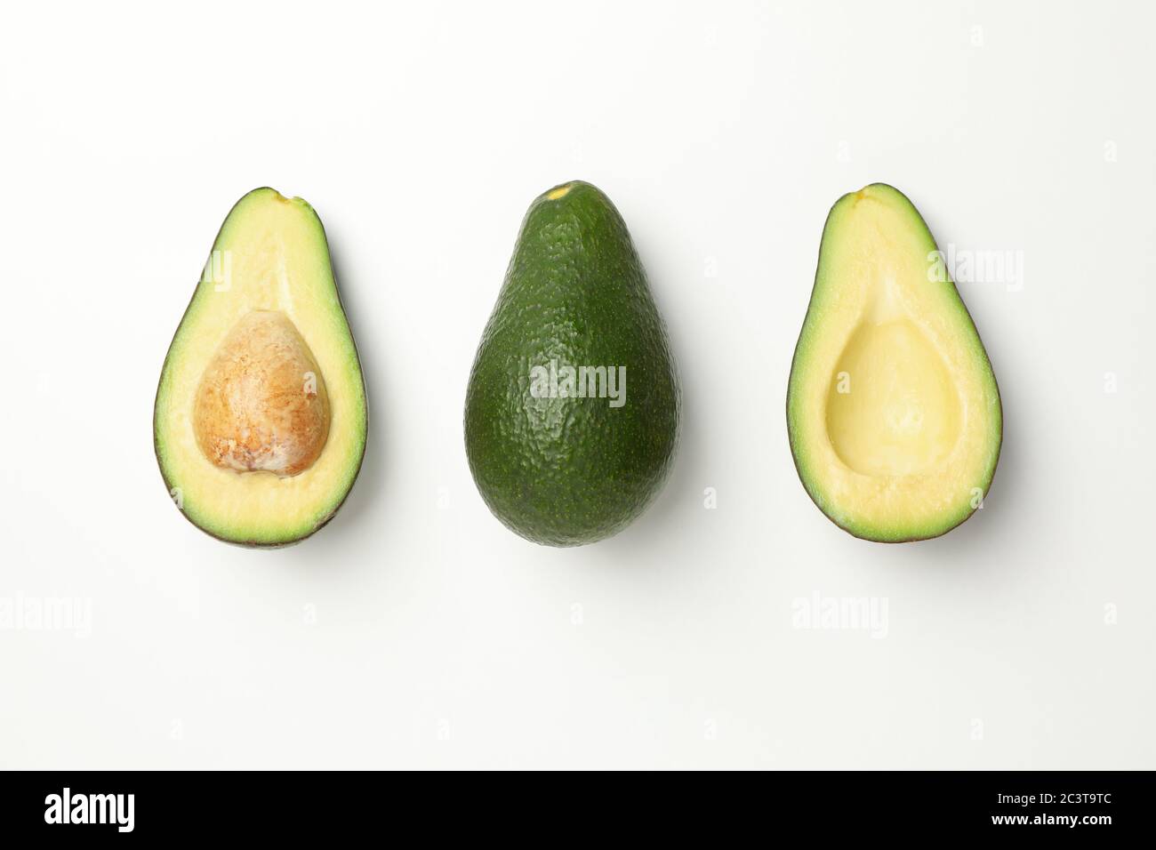 Flat lay with avocado on white background, top view Stock Photo - Alamy