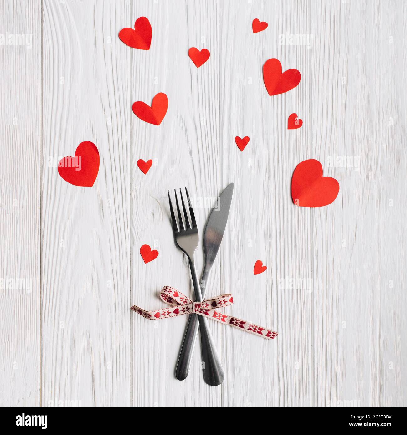 Valentines day table setting with fork, knife and red dinner Stock ...