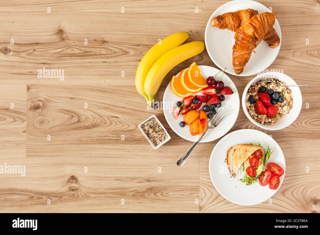 breakfast background. French crusty croissants, muesli, lots of sweet ...