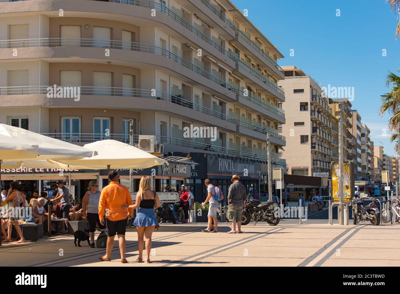 Canet en Roussillon, France: June 21, 2020: People walk on the maritime ...
