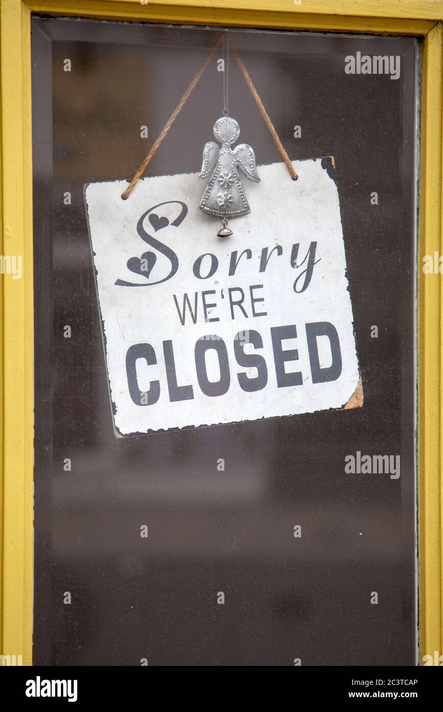 Sorry We're closed Sign in Shop Doorway Stock Photo - Alamy