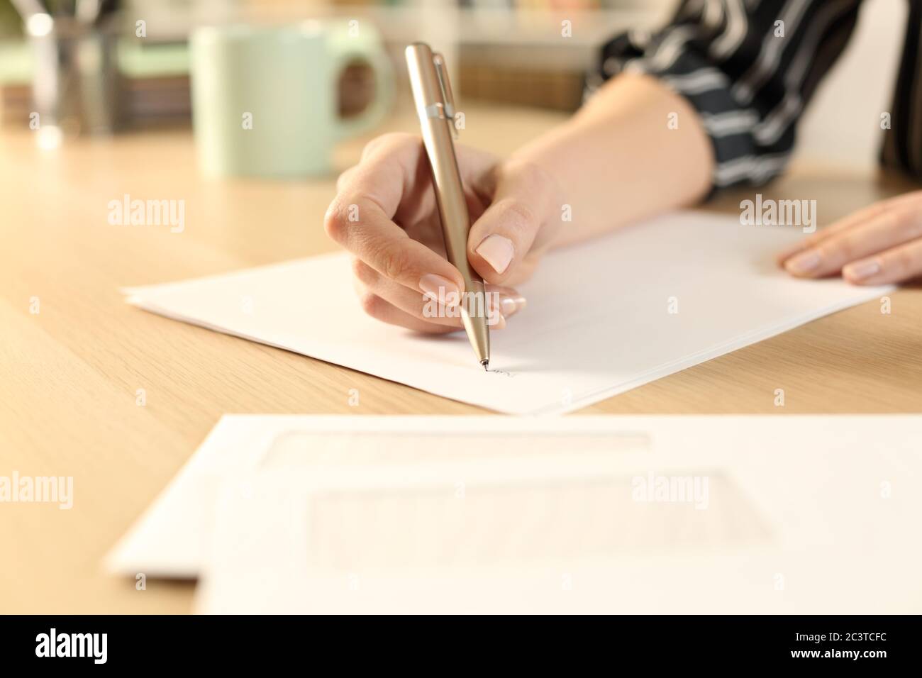 Person Typing A Letter