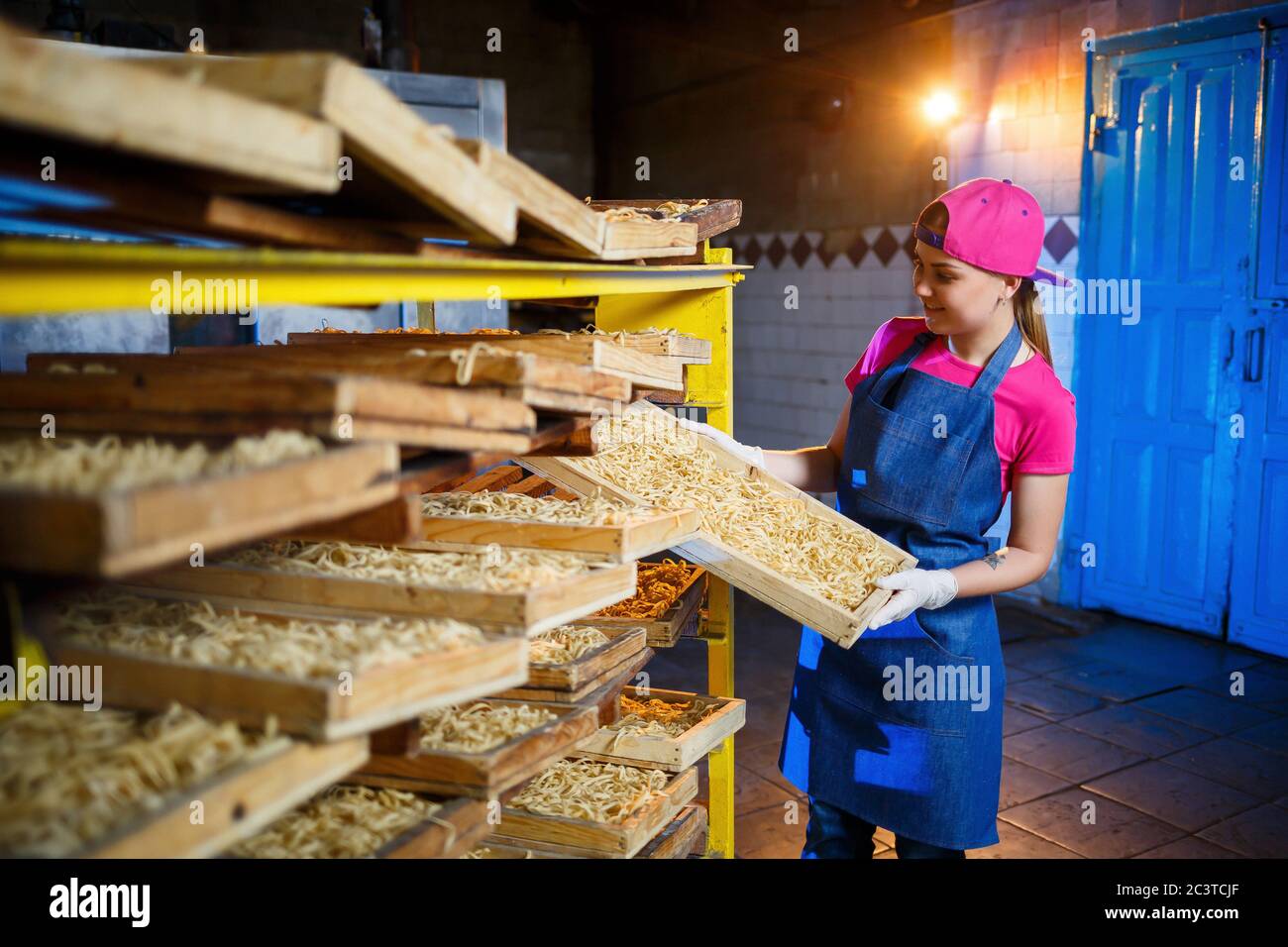 Manufacturing macaroni in production line hi-res stock photography and ...