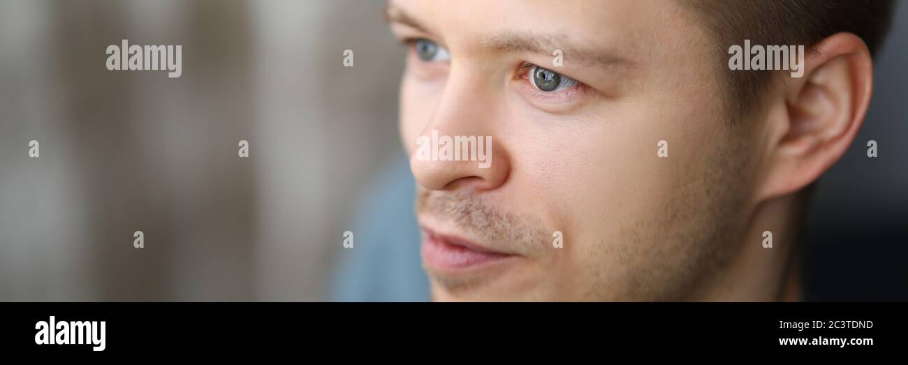 Close-up portrait in profile of an ordinary guy Stock Photo - Alamy
