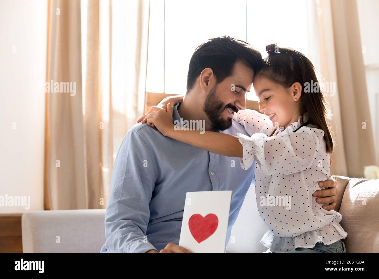 Children touching foreheads hi-res stock photography and images - Alamy