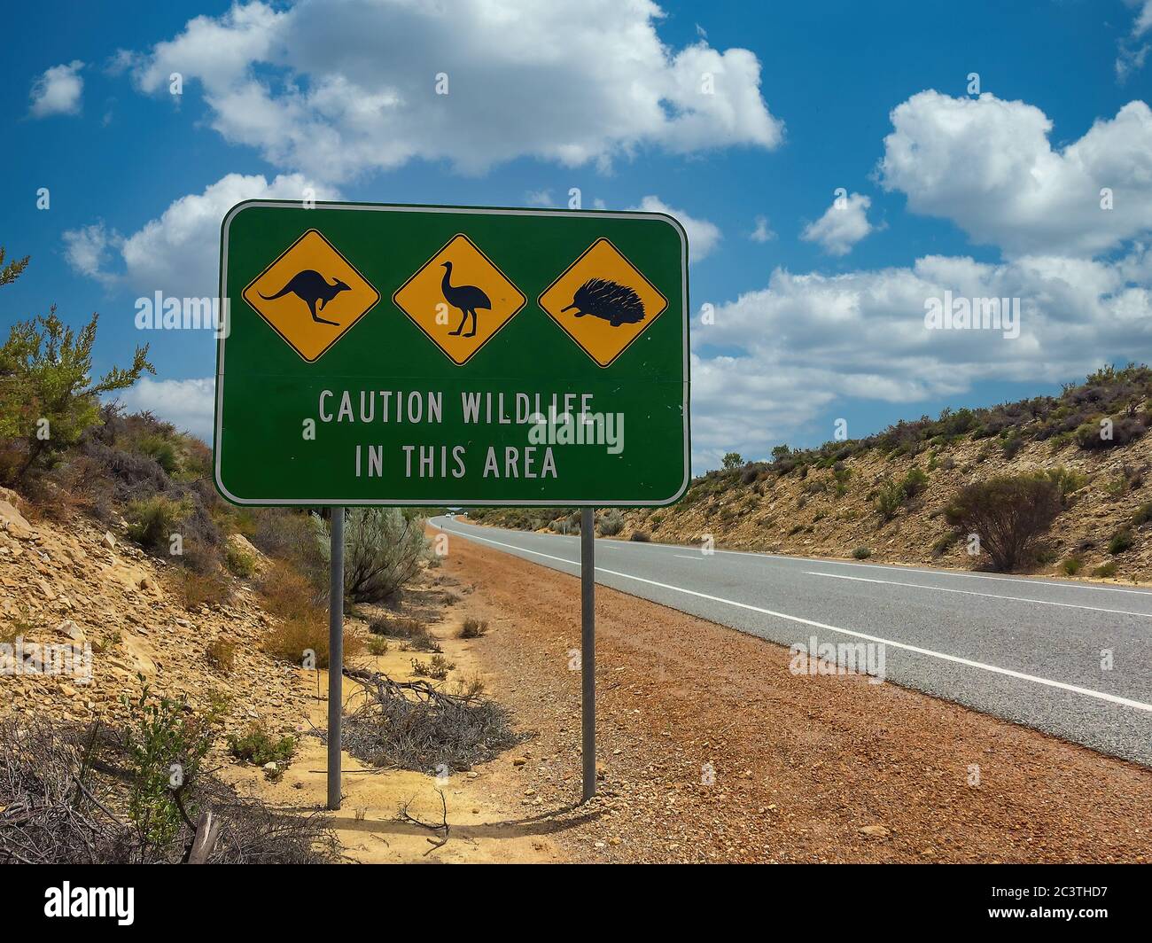 Warning sign for animals in Australia on the road Stock Photo - Alamy