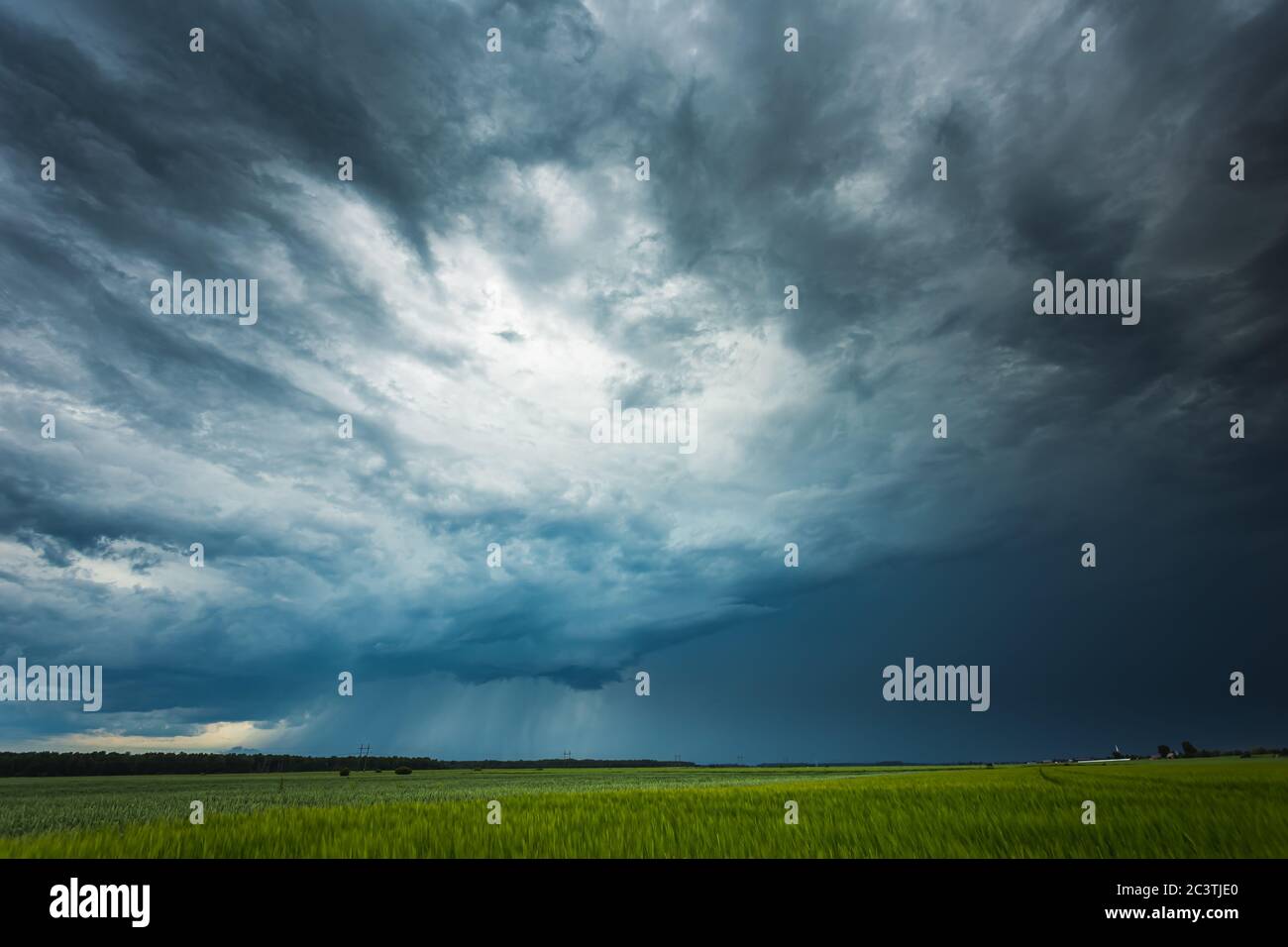 Supercell storm clouds with intense tropic rain Stock Photo - Alamy