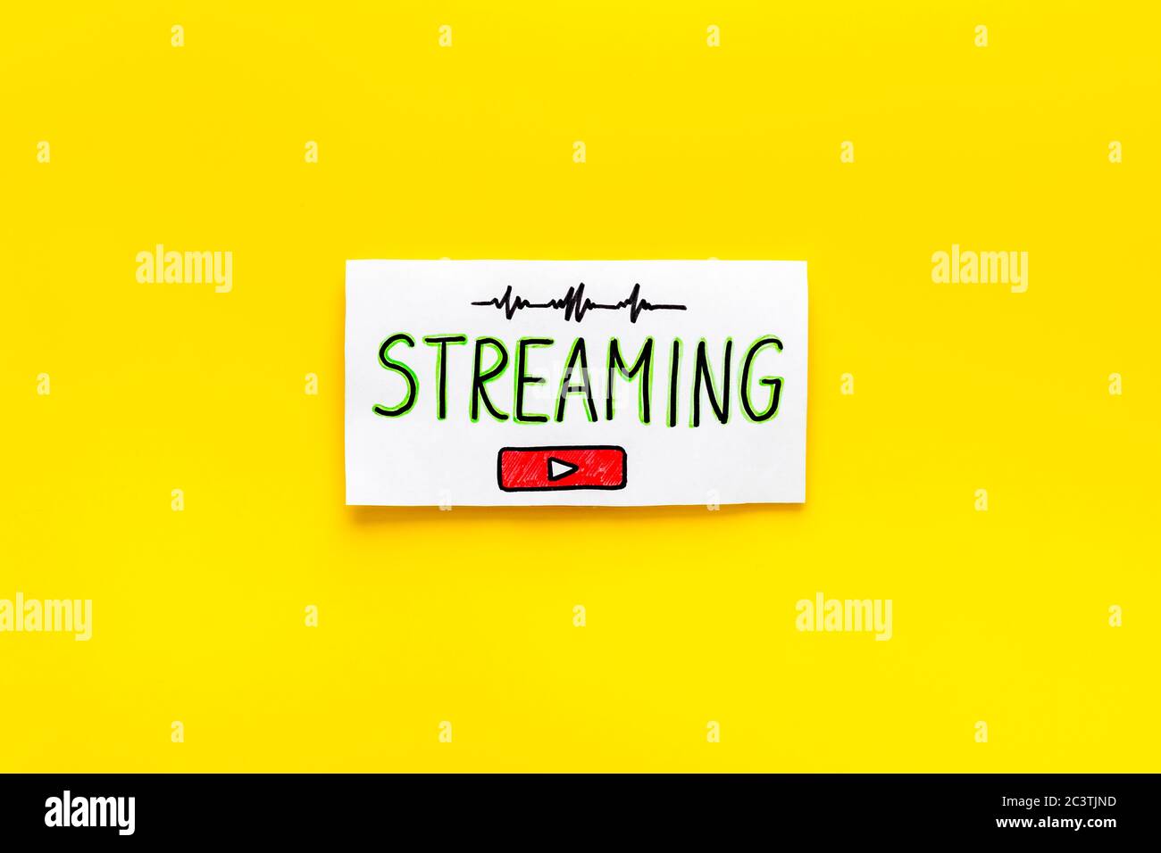 Live streaming concept - words on paper tablet on yellow top view Stock ...