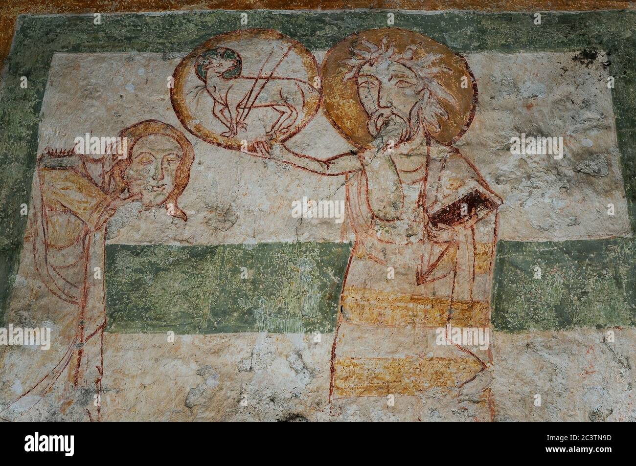 Headless figure of Saint John the Baptist (left) offers his severed ...