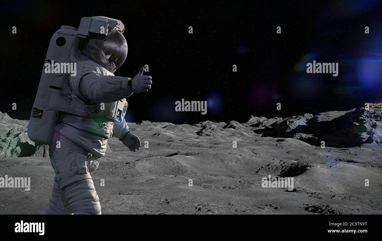 astronaut on the surface of the Moon showing thumbs Stock Photo - Alamy