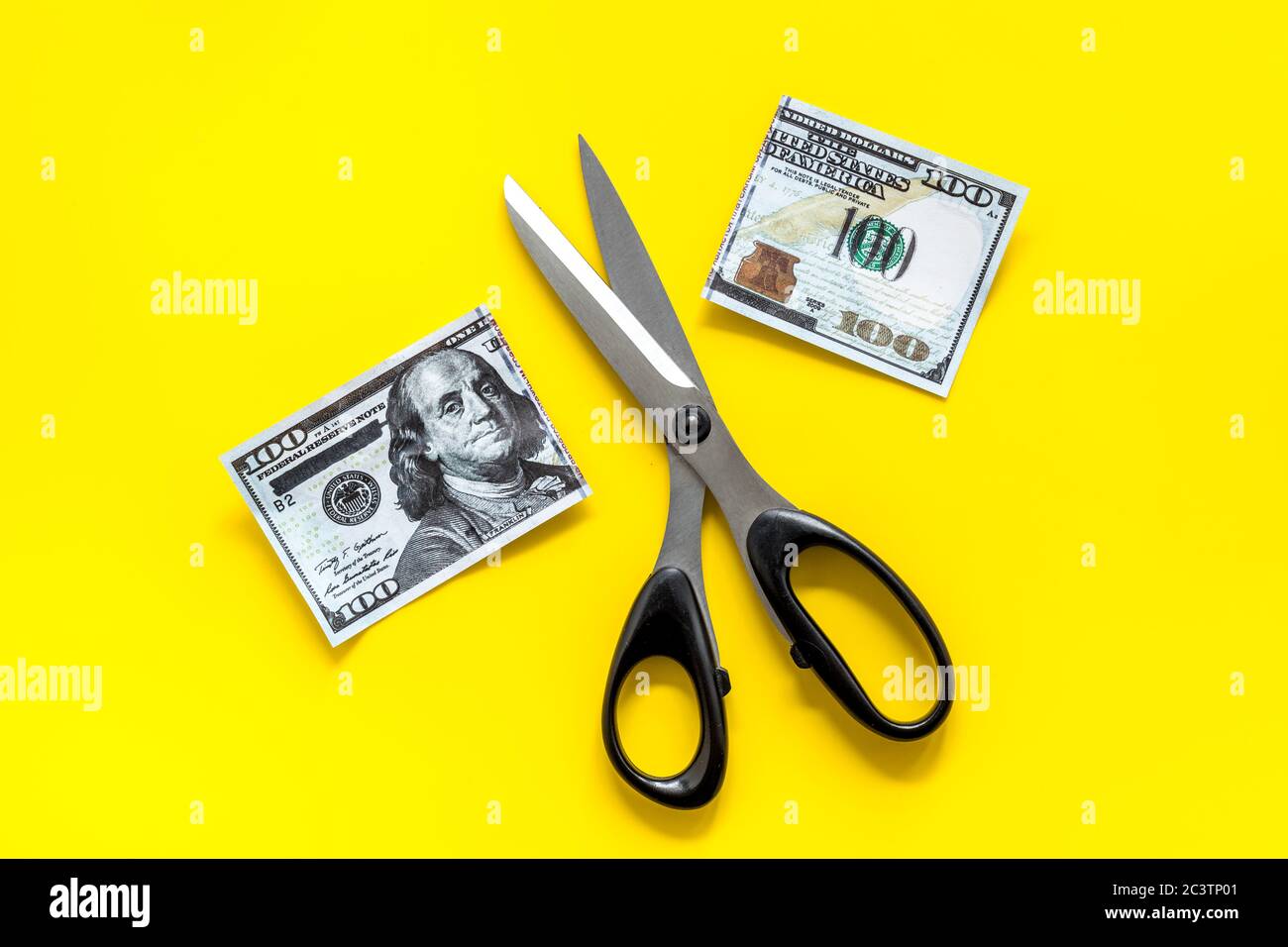 Cutting of US dollar banknote. Economic crisis concept Stock Photo - Alamy
