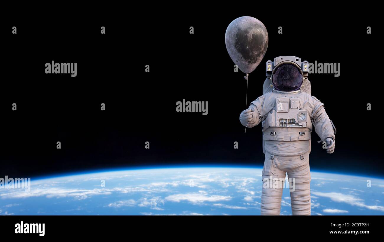 astronaut with Moon balloon in orbit of planet Earth Stock Photo - Alamy