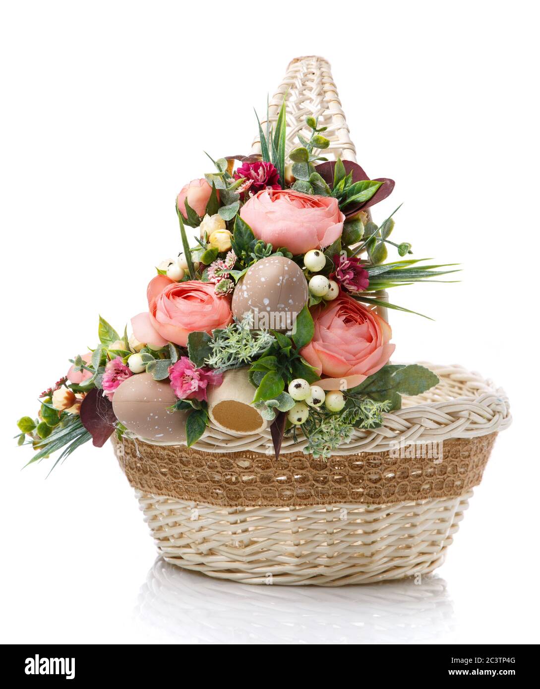 Wicker design baskets are decorated with a floral arrangement for ...