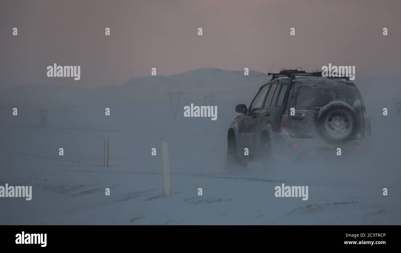 Driving on an icy road and in proper winter conditions in Iceland Stock ...