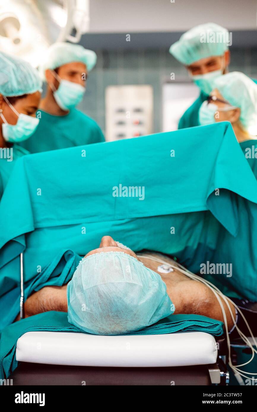 Team surgeon at work in operating room Stock Photo - Alamy