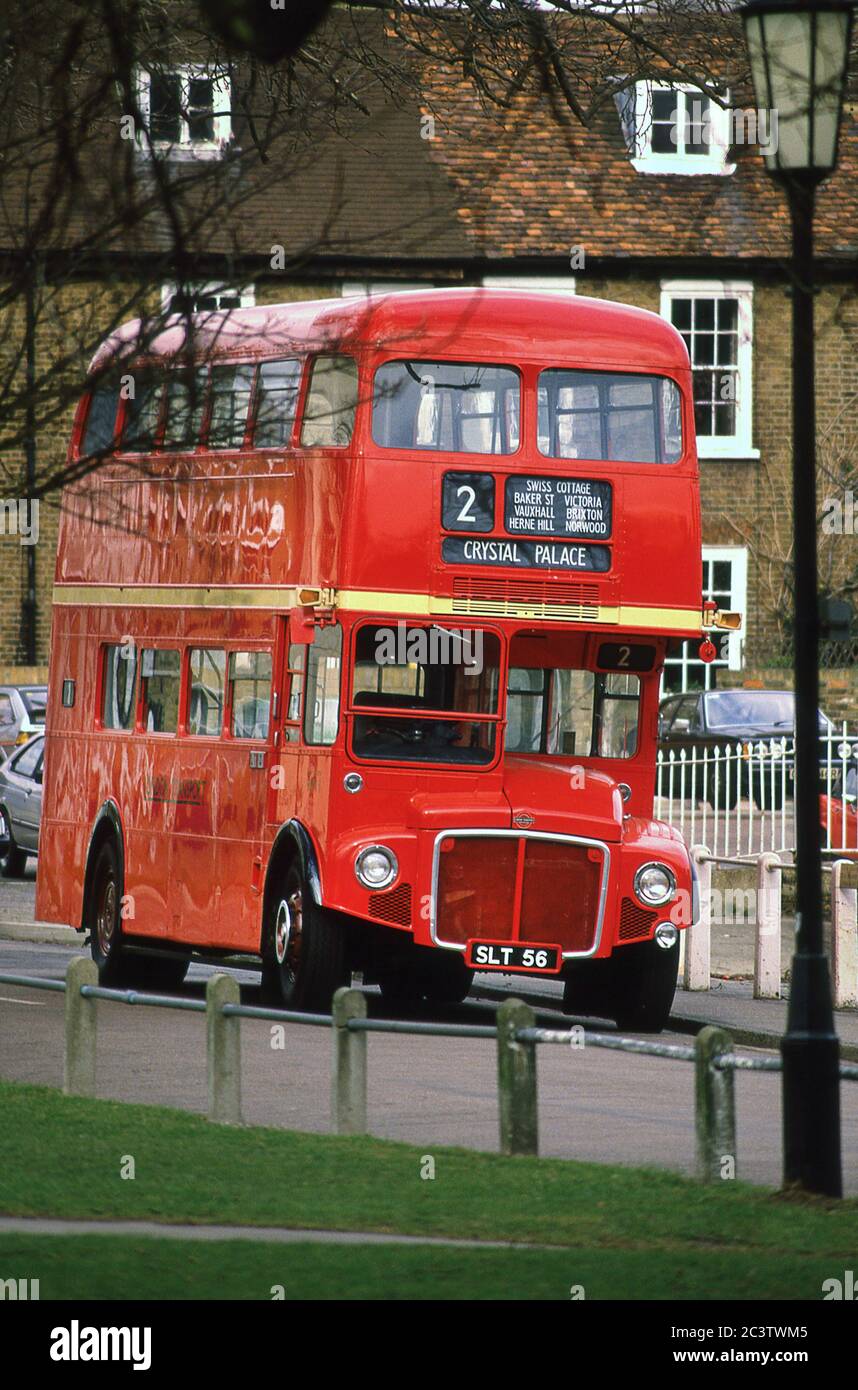 Routemaster London bus waiting at a bus stop in North London 1986 Stock ...