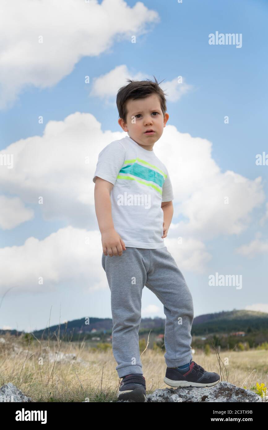 Boy rock face sitting on hi-res stock photography and images - Alamy
