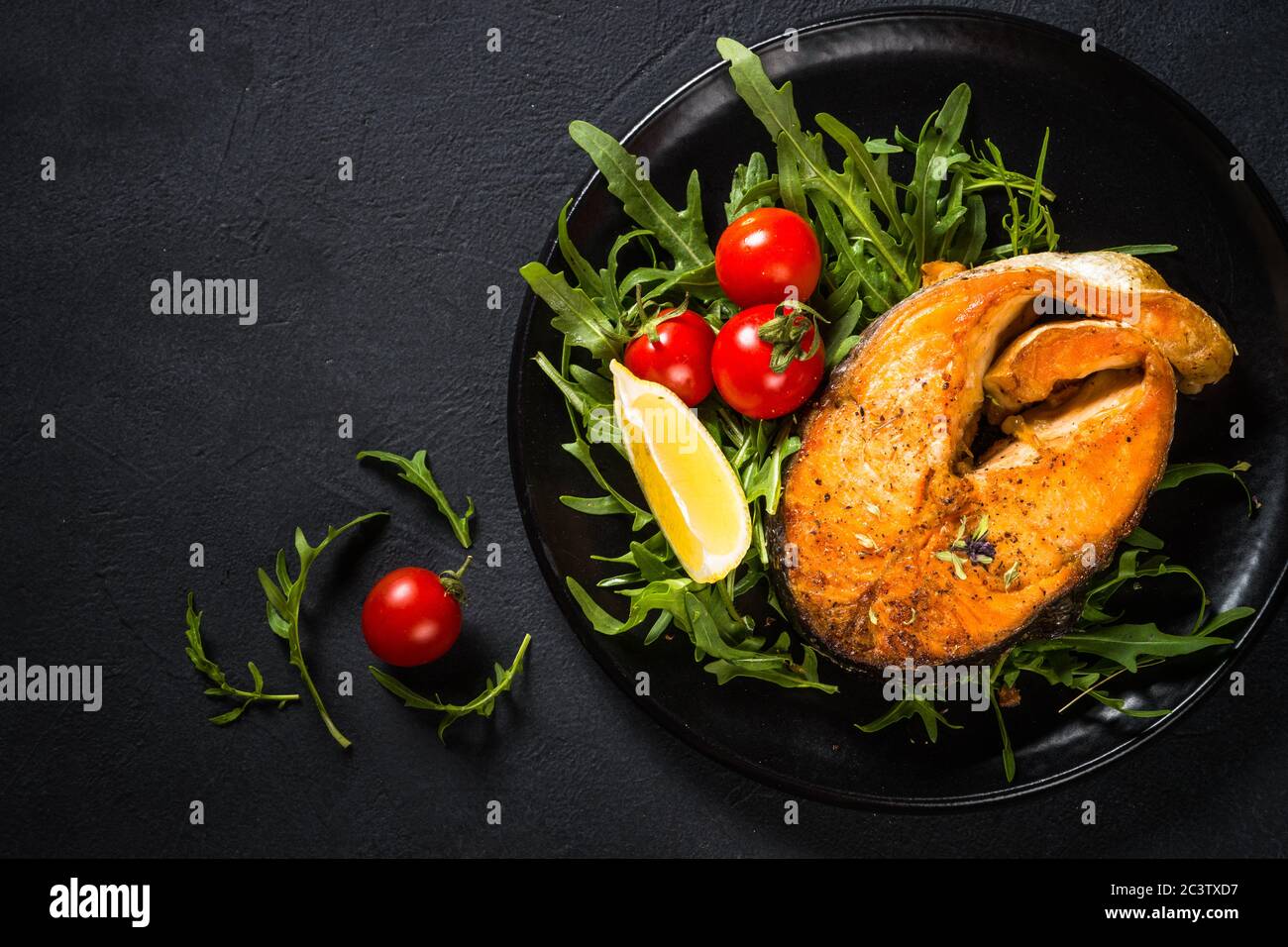 Salmon fish with fresh salad Stock Photo - Alamy