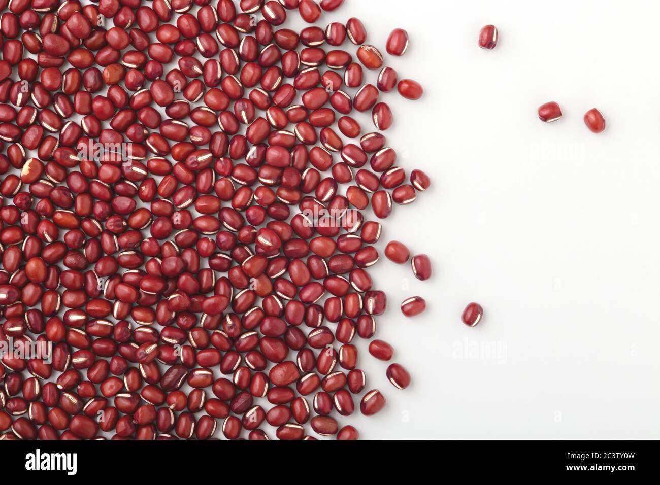 Azuki red bean on white background, top view Stock Photo - Alamy