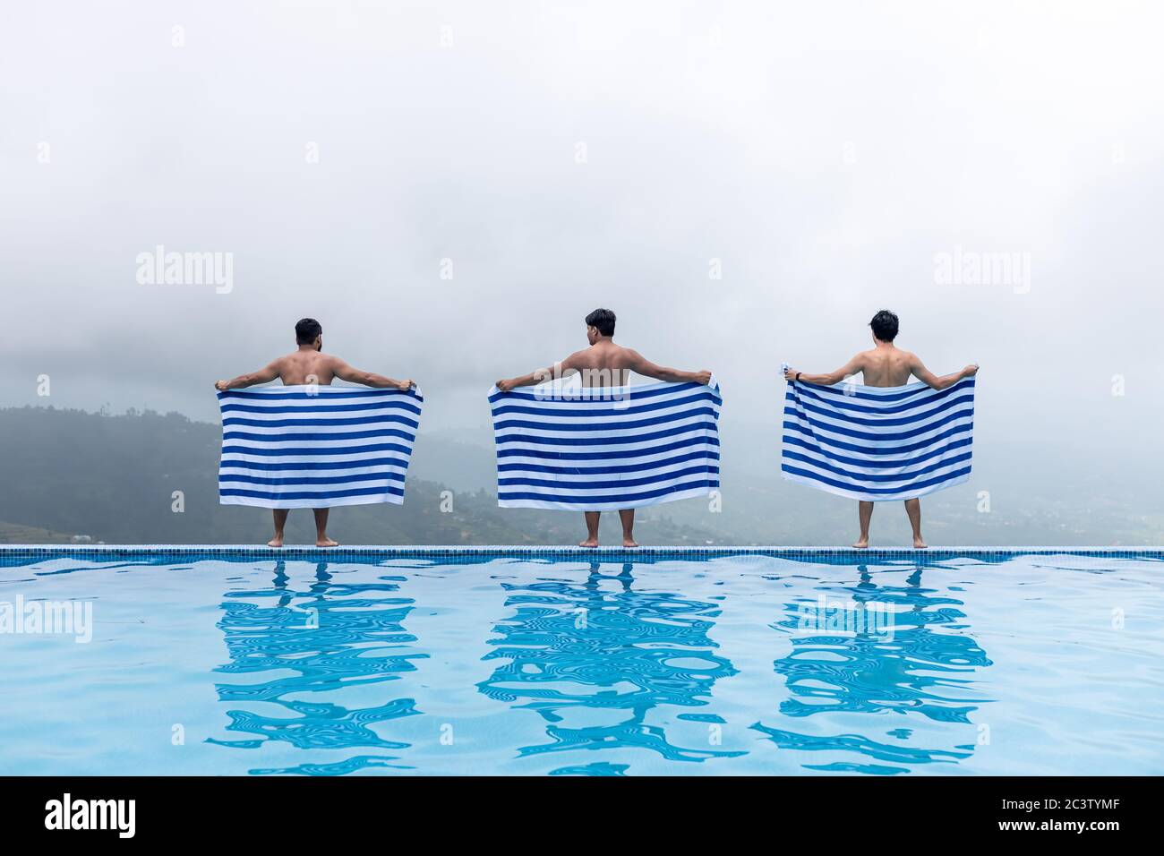 Swimmer standing swimming pool hi-res stock photography and images - Alamy