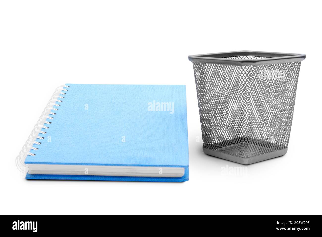 Note book with stationery basket isolated over white background Stock ...