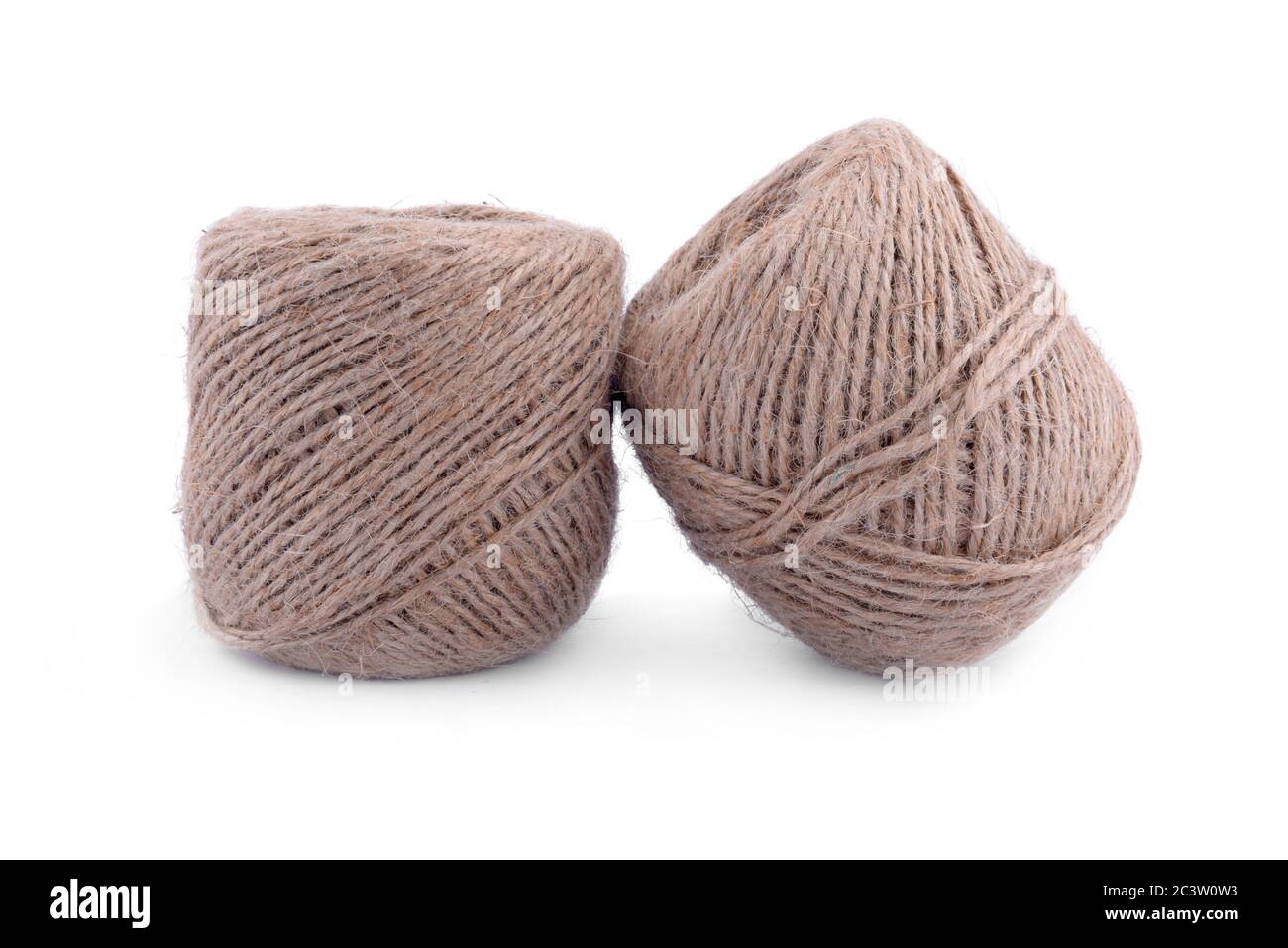 Brown wool yarn isolated over white background Stock Photo - Alamy