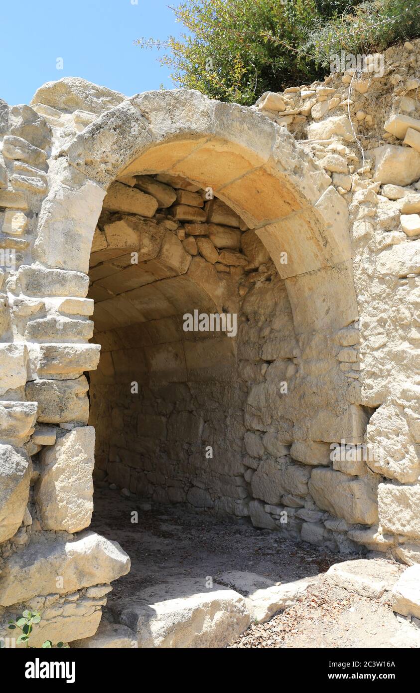 Old stone arch in underground entrace. Antique city Amathus in Cyprus ...