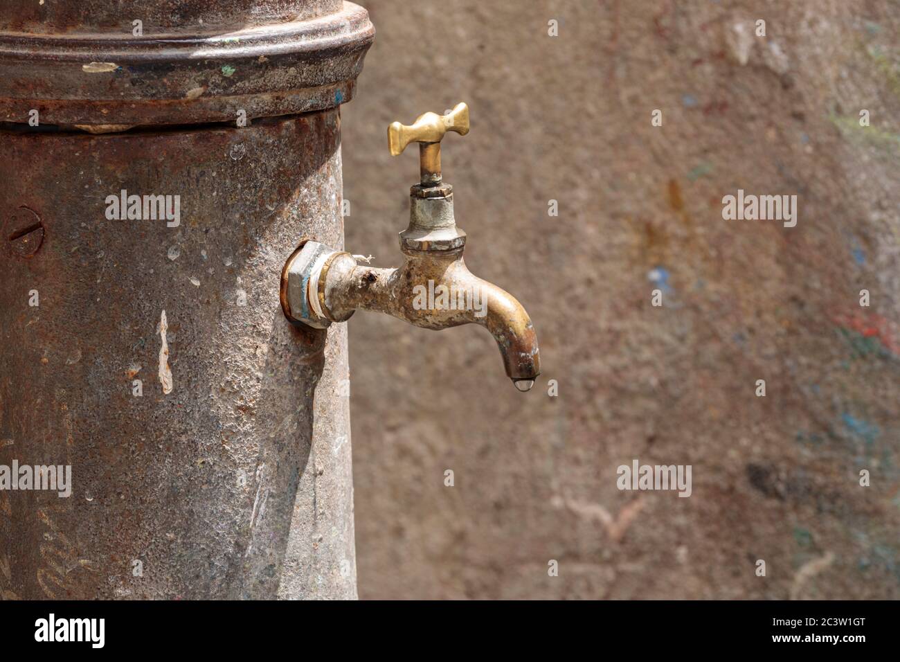 Water tap in the medieval hill town of Pitigliano, Tuscany, Italy Stock ...