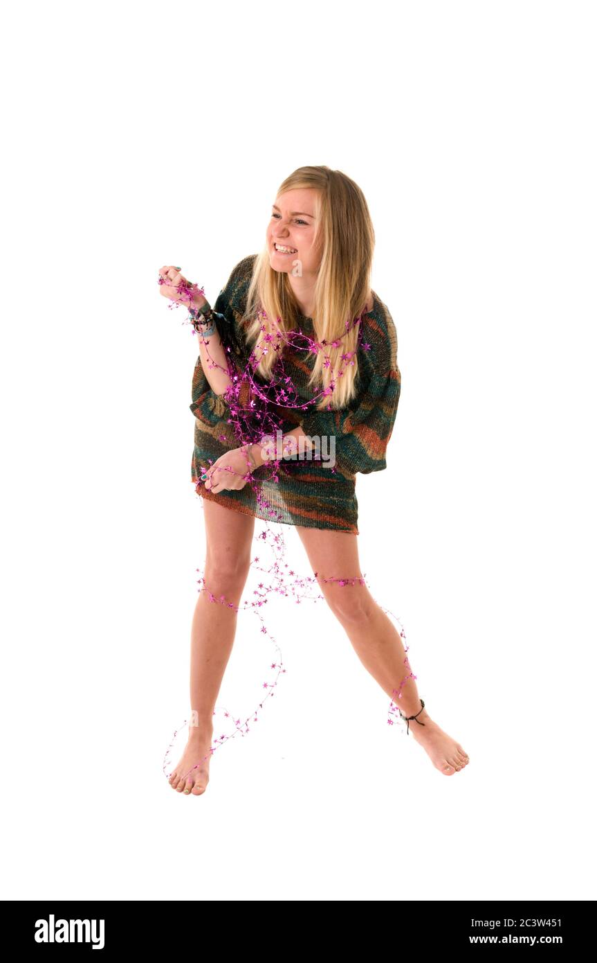 Young blond woman entangled in wire On white Background Stock Photo - Alamy