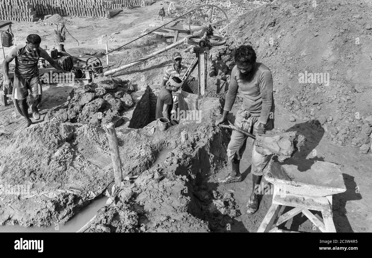 Brick field hard work Stock Photo - Alamy