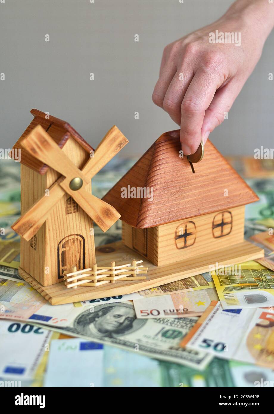 Coin money box hand not piggy bank hi-res stock photography and images ...