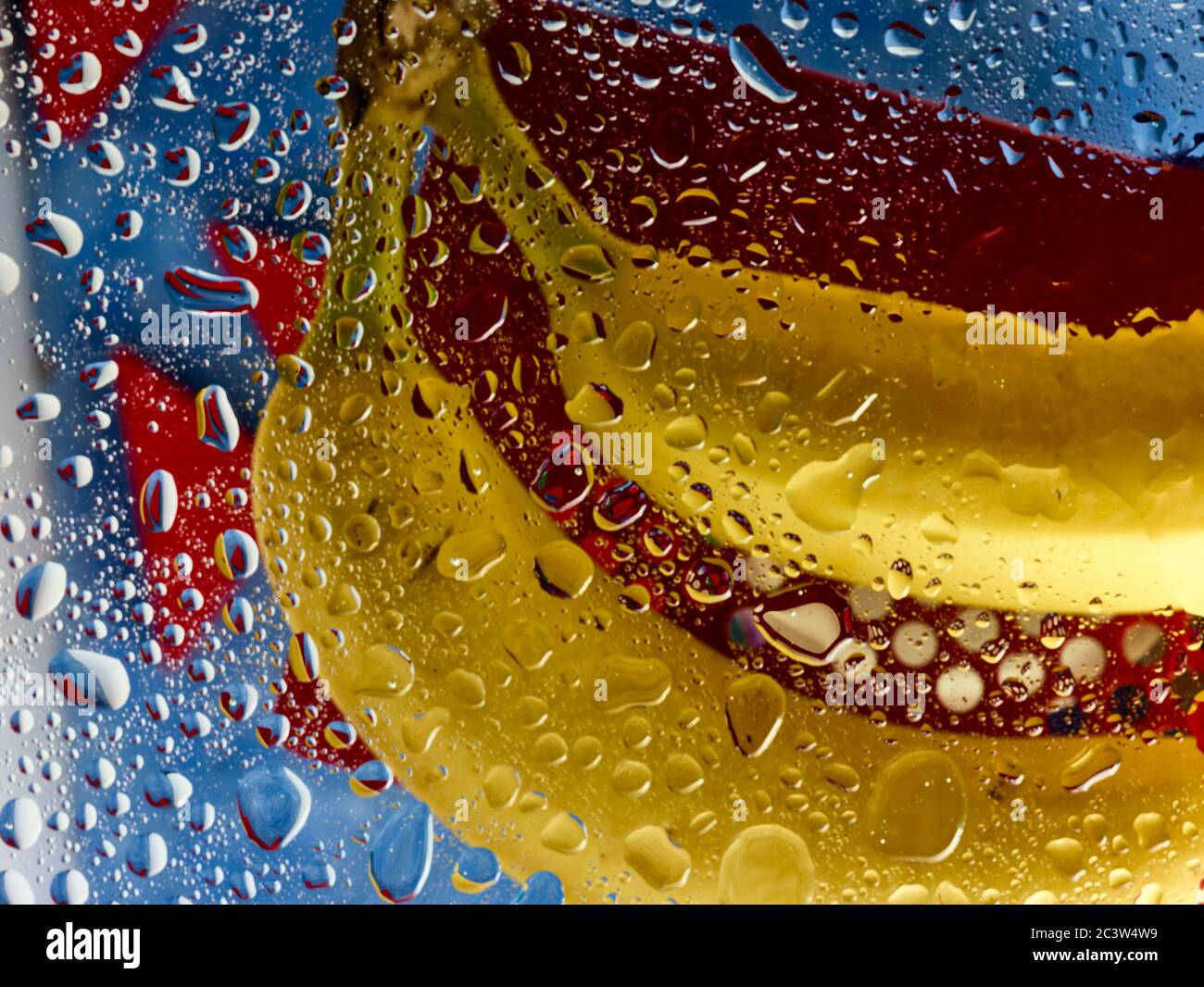 Ripe bananas and water droplets close-up semi-abstract natural ...