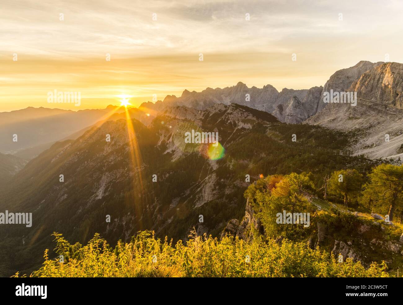Amazing sunrise in the mountains. Backlight Sunlight with beautiful ...