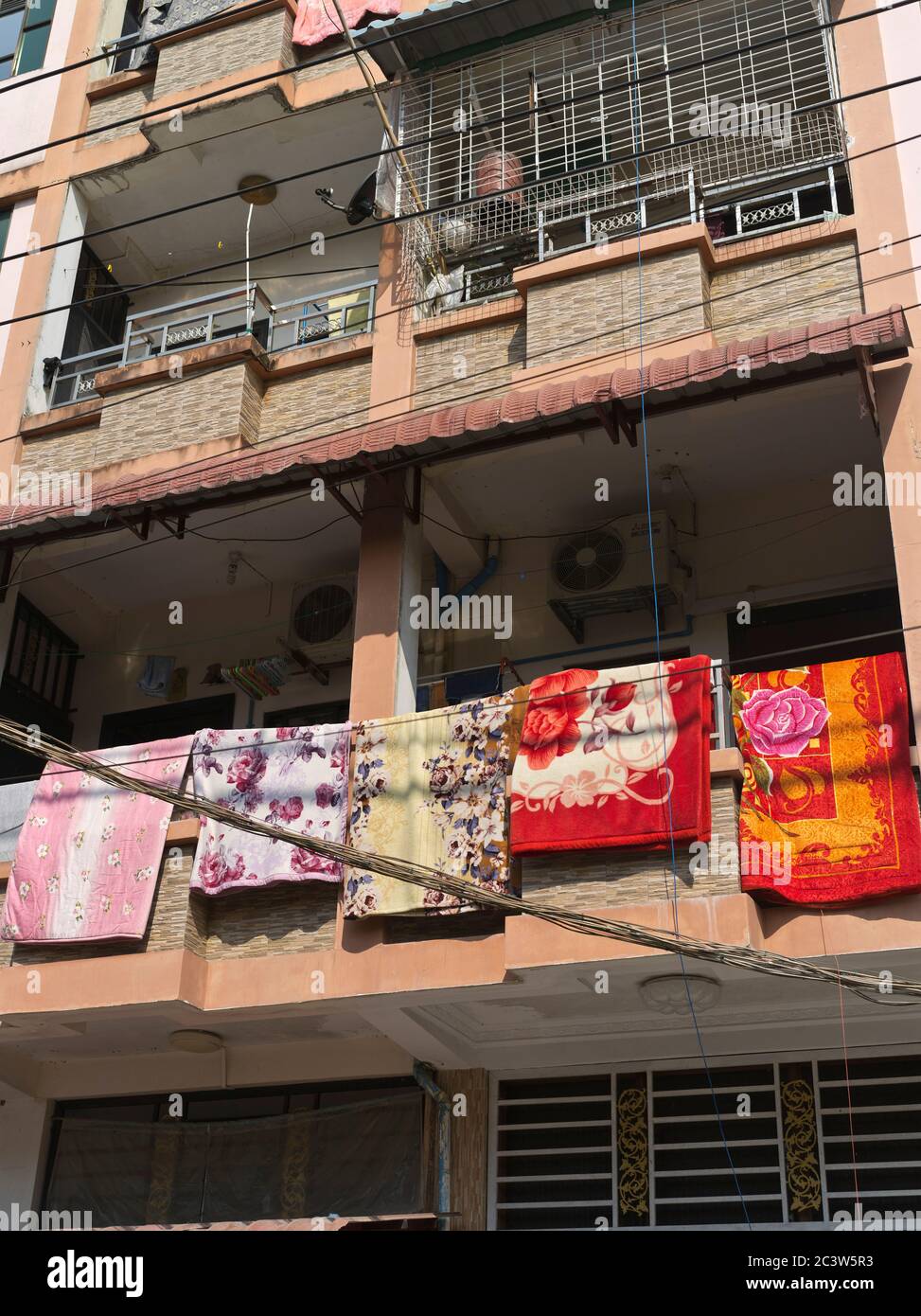 dh Thanlyin YANGON MYANMAR Local housing village apartment flats drying ...