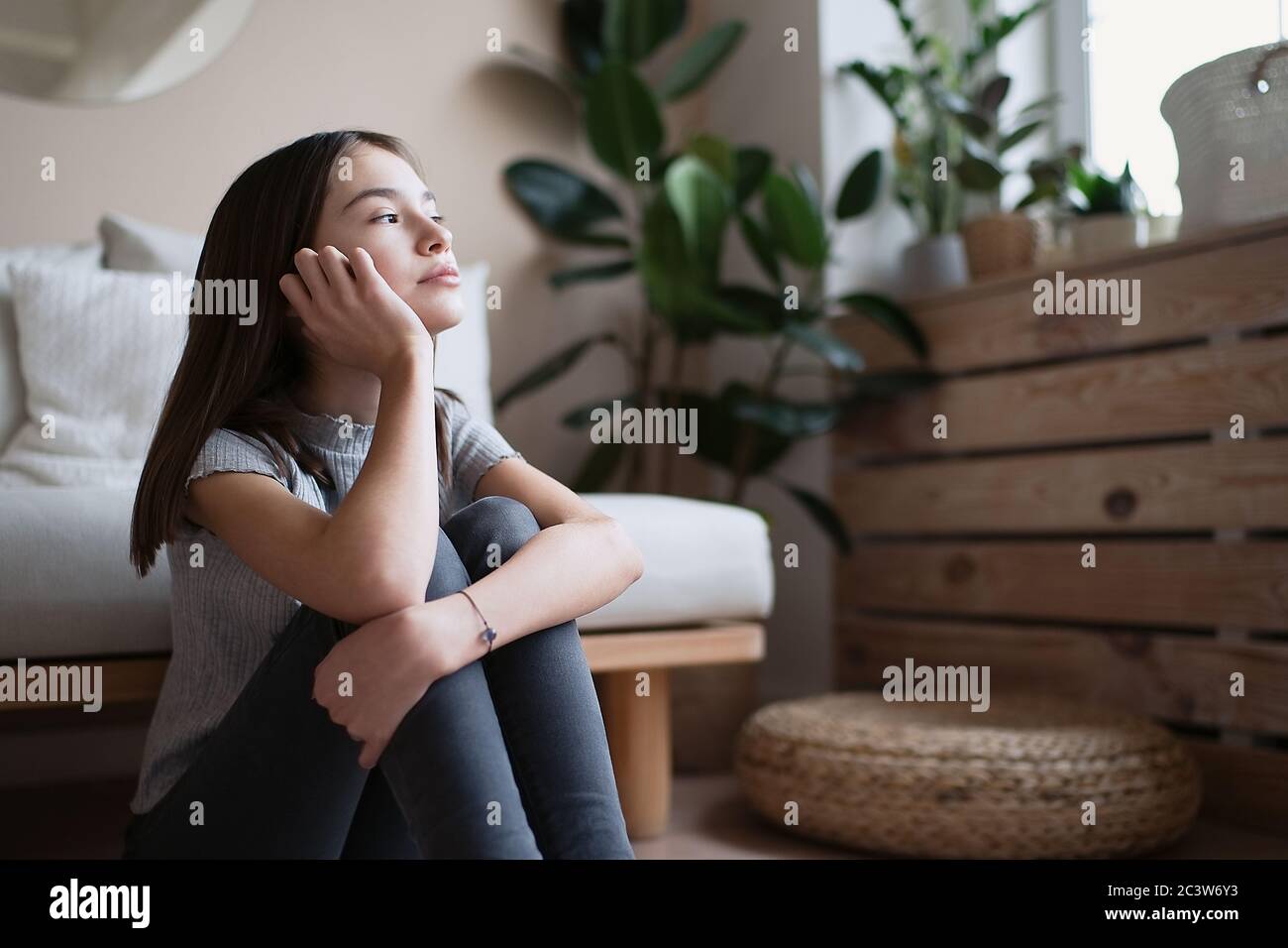 Sad teenager feeling bad alone, feeling depressed, regrets of mistake ...