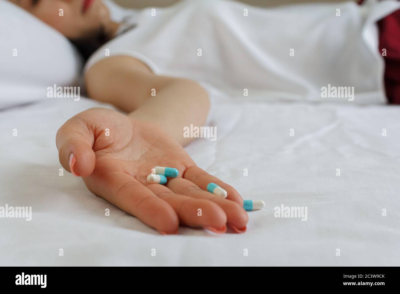 Close up of woman hand with many pills. Drug addiction and social issue ...
