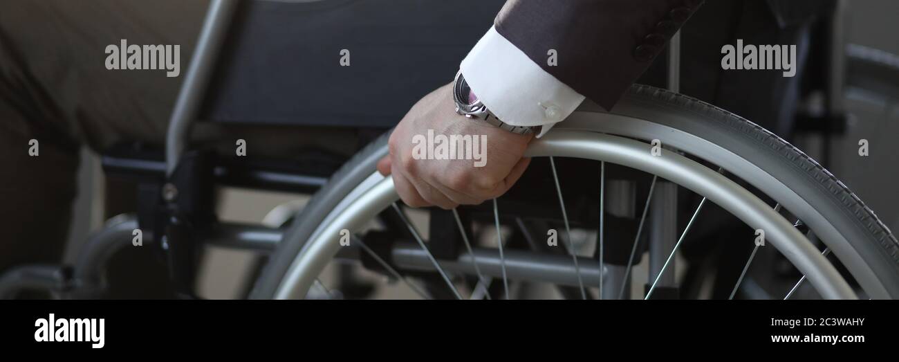 Guy in disabled carriage Stock Photo - Alamy