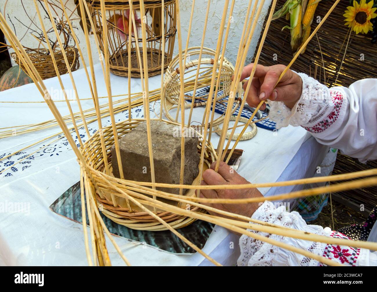 The initial stage of creating a wicker basket Stock Photo - Alamy