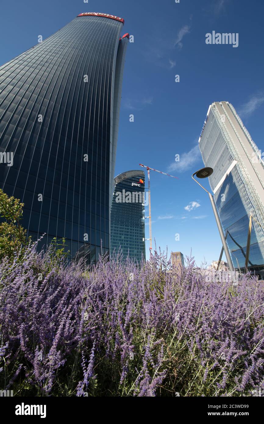 a beautiful photograph of the skyscrapers of citylife by day, Milan ...
