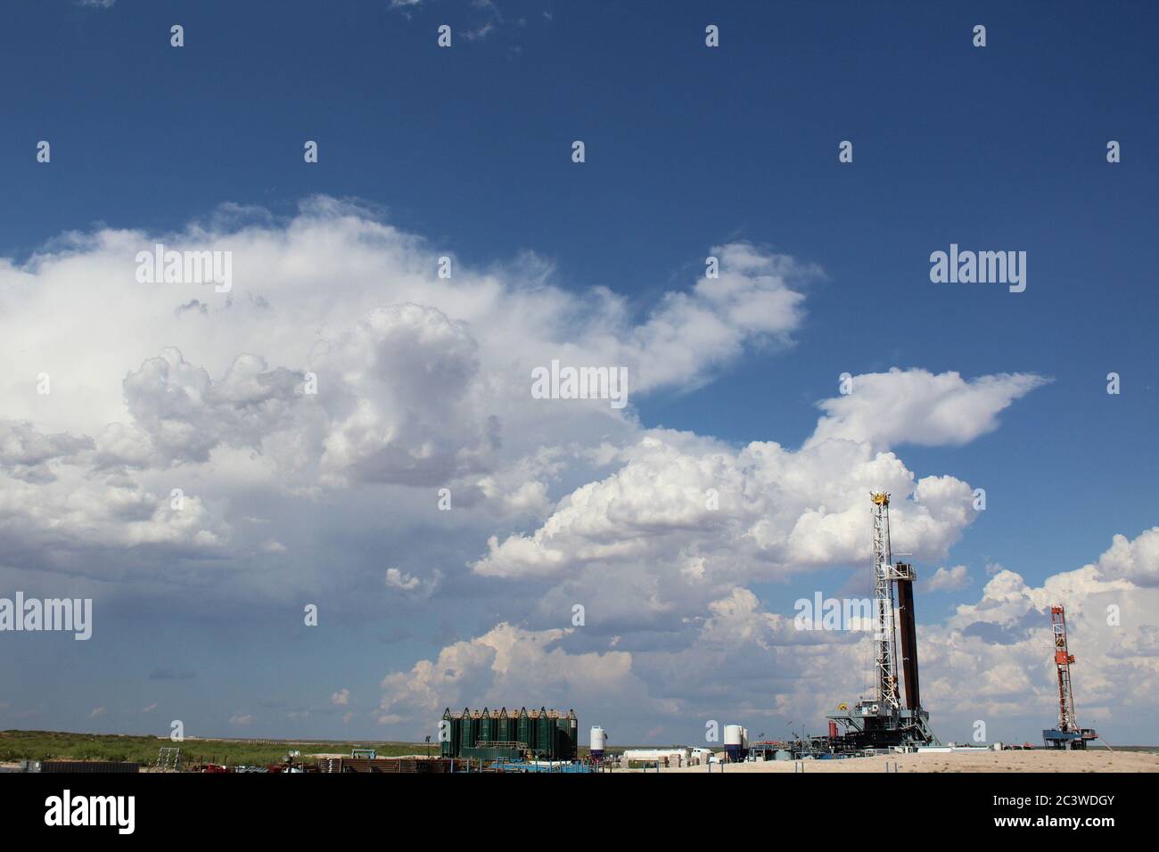 two drilling rigs in west texas Stock Photo - Alamy