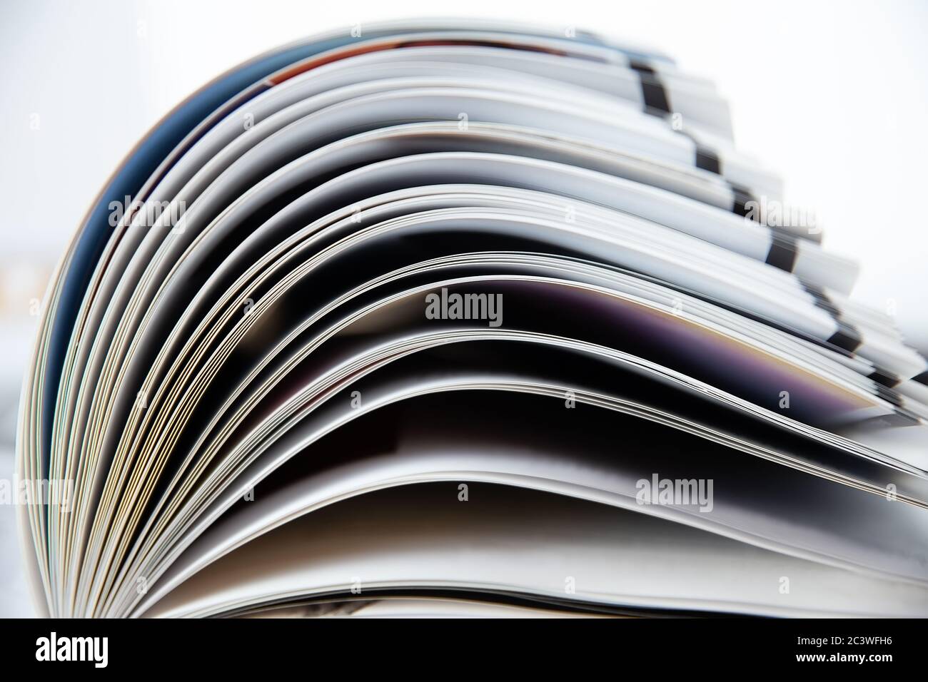 Closeup background of an open book with bending pages Stock Photo - Alamy
