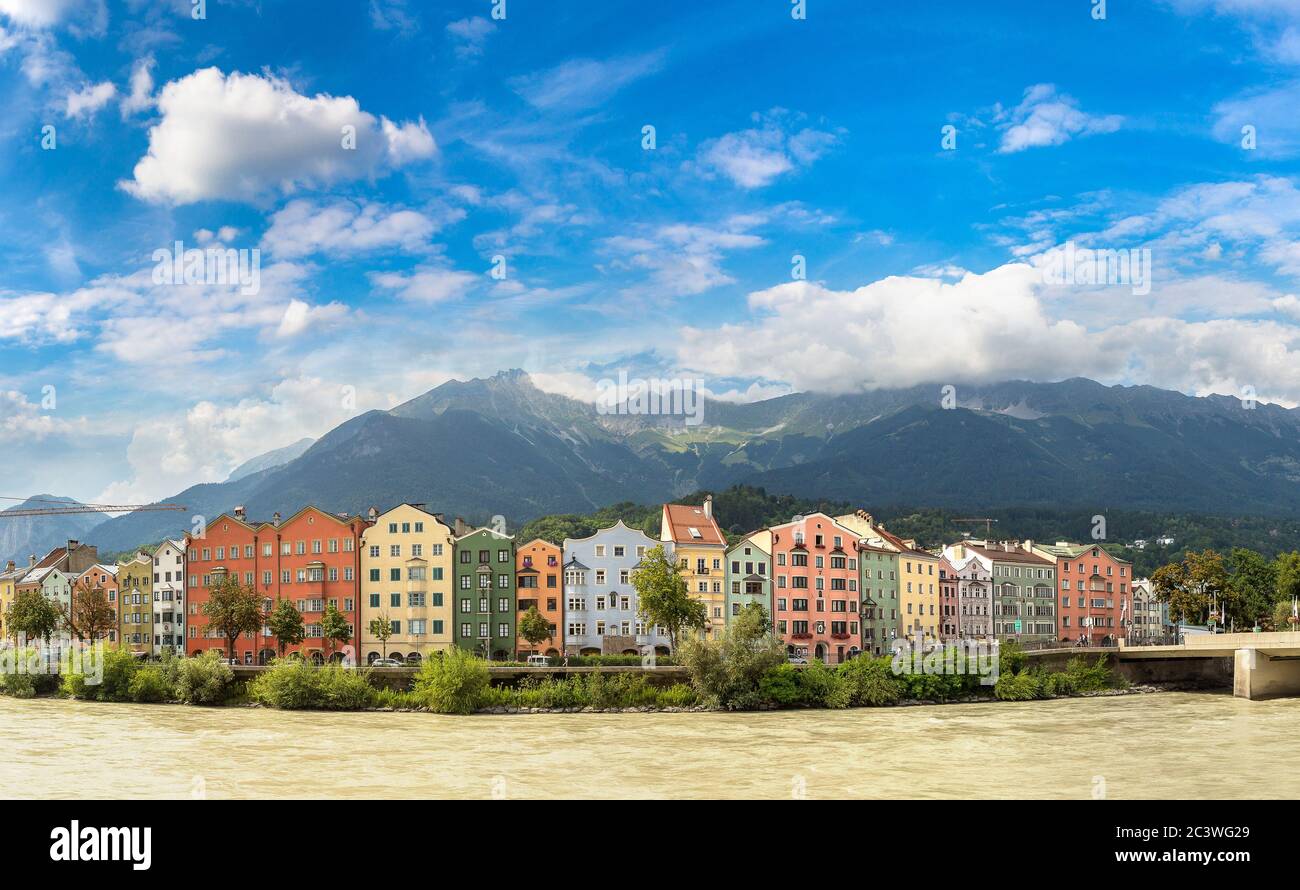 Building facade and Alps mountains behind in Innsbruck in a beautiful ...