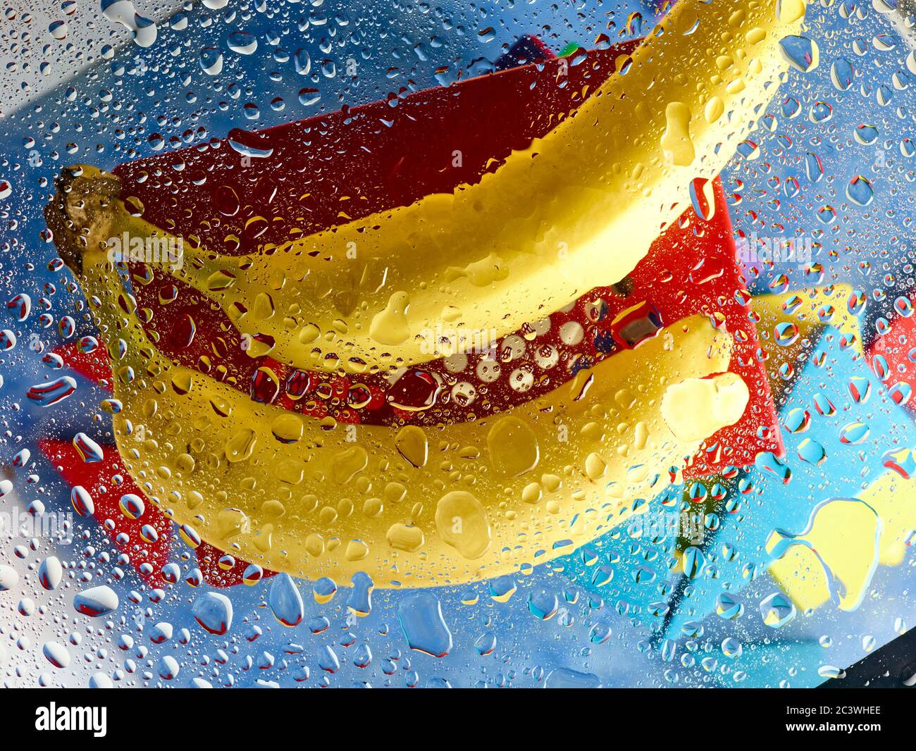 Ripe bananas and water droplets close-up semi-abstract natural ...