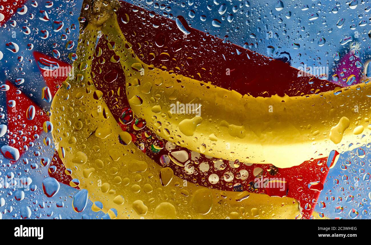 Ripe bananas and water droplets close-up semi-abstract natural ...