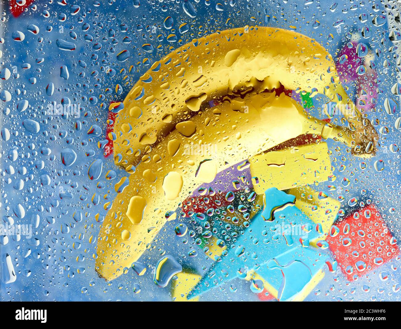 Ripe bananas and water droplets close-up semi-abstract natural ...