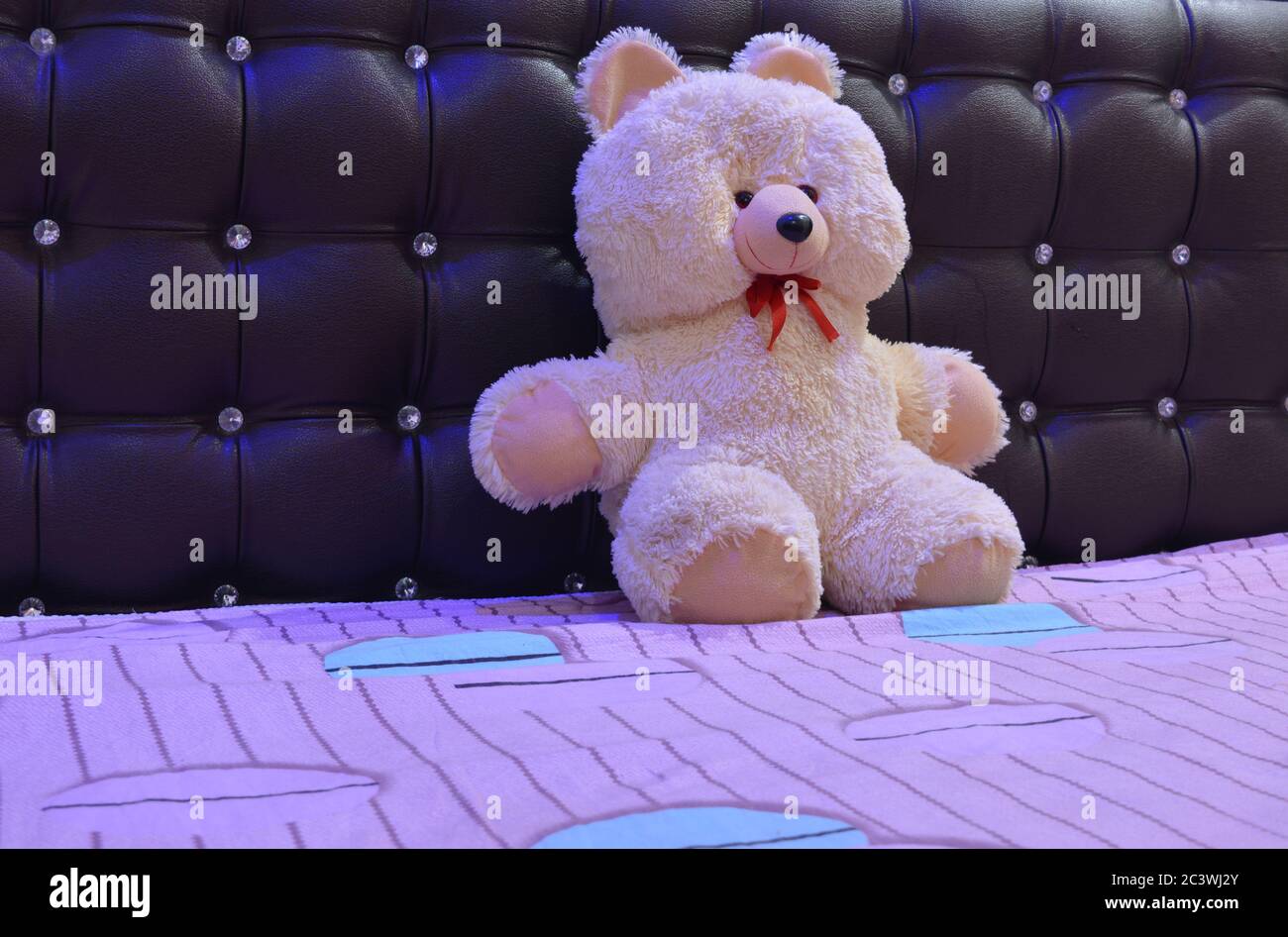 Cute teddy bear in the bed Stock Photo - Alamy