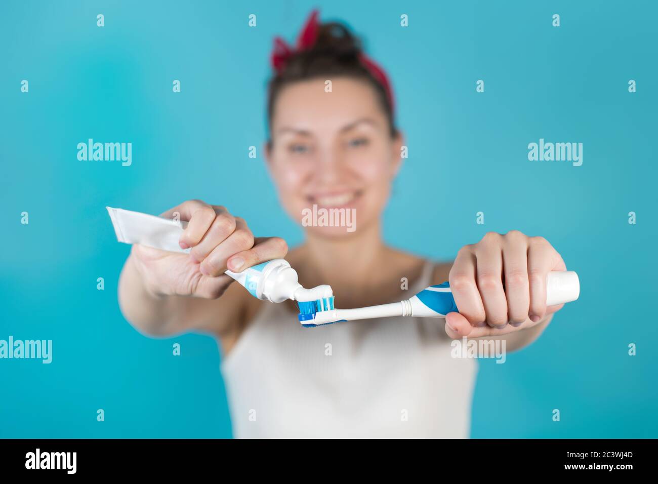 Squeeze tube toothpaste young person hi-res stock photography and ...