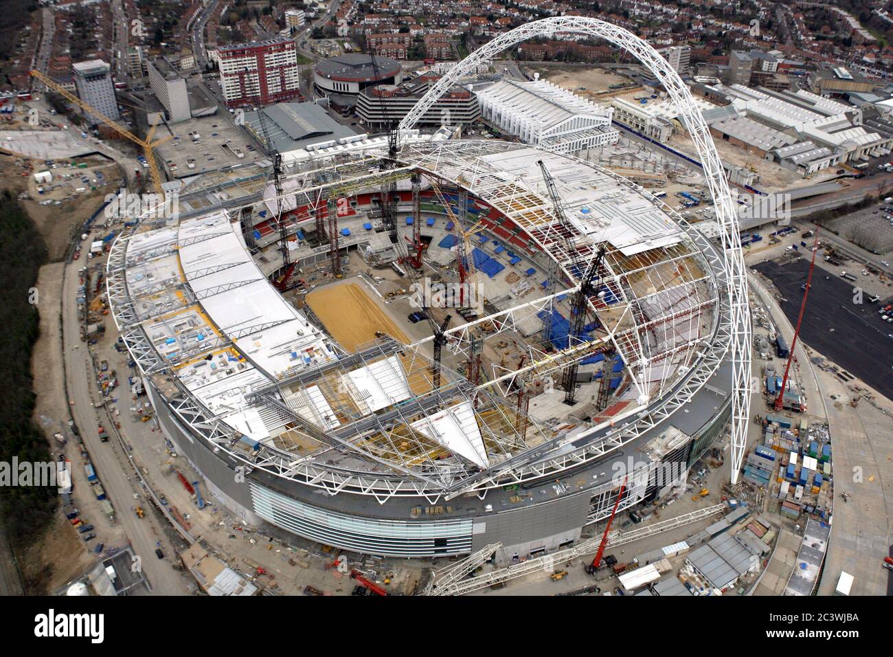 Rebuilding Wembley Stadium. A girder falls from the roof structure and ...