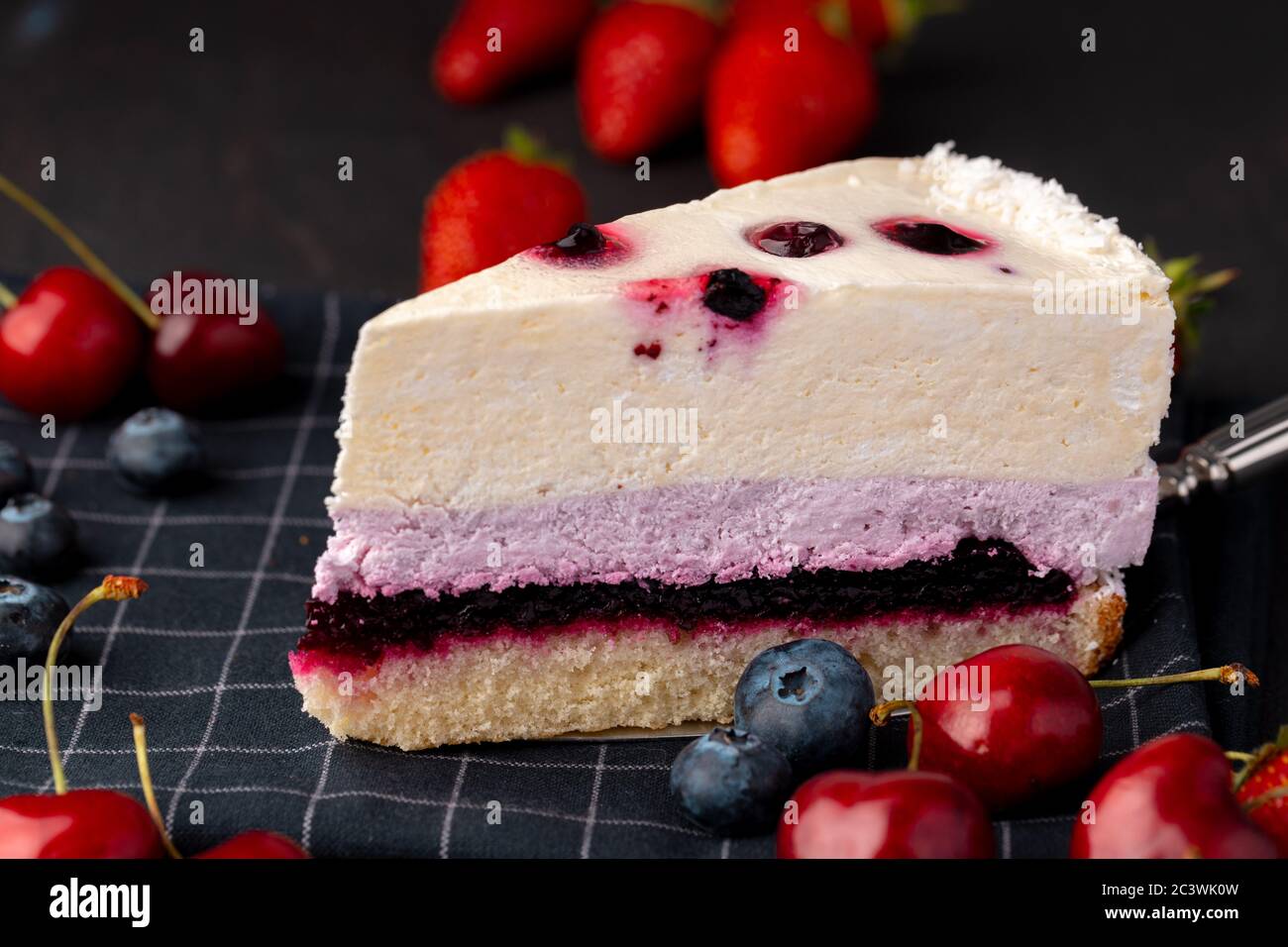 Soft berry souffle cake decorated with berries Stock Photo - Alamy