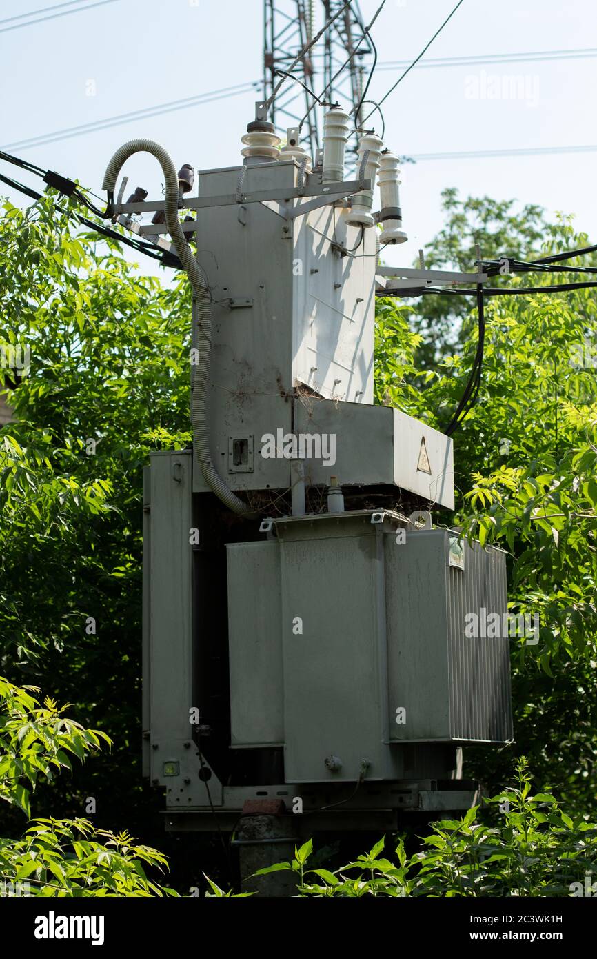 electric transformer among trees in summer Stock Photo - Alamy
